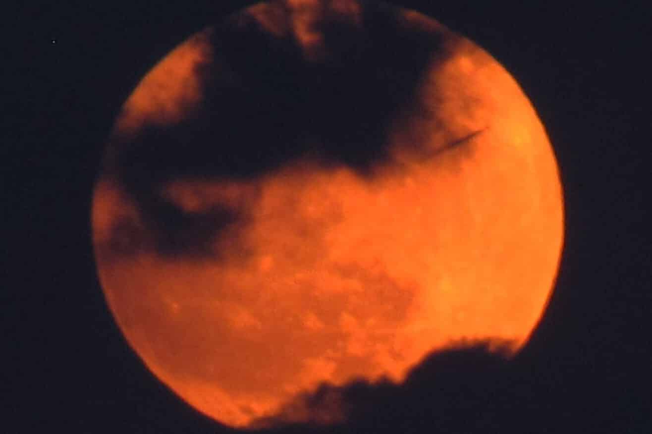 Orange Moon Meaning & Symbolism (Imbalance & Surprises)